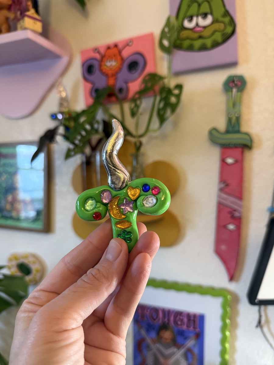 A cursed imperfect wizard snake yikes (green and gold), A Weird Little ...