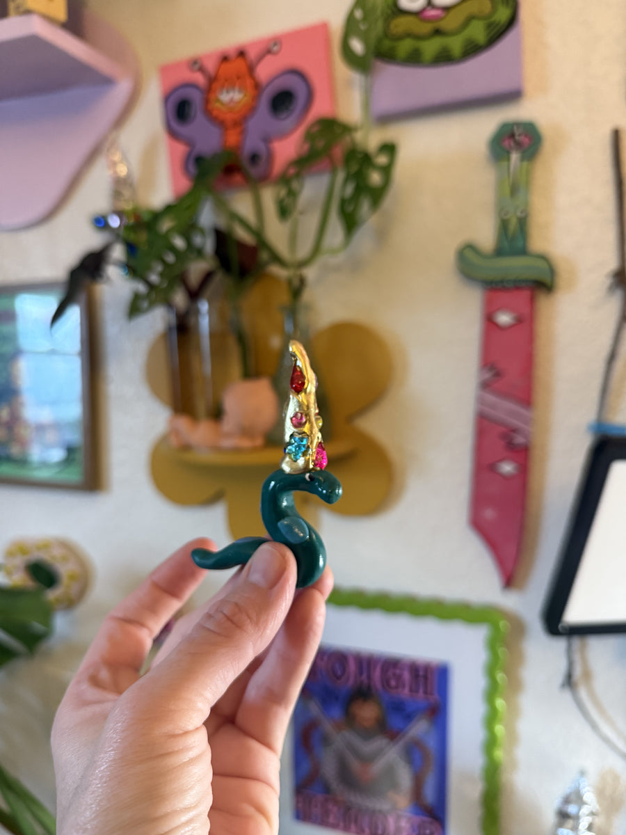 A cursed imperfect wizard snake yikes (green and gold), A Weird Little ...